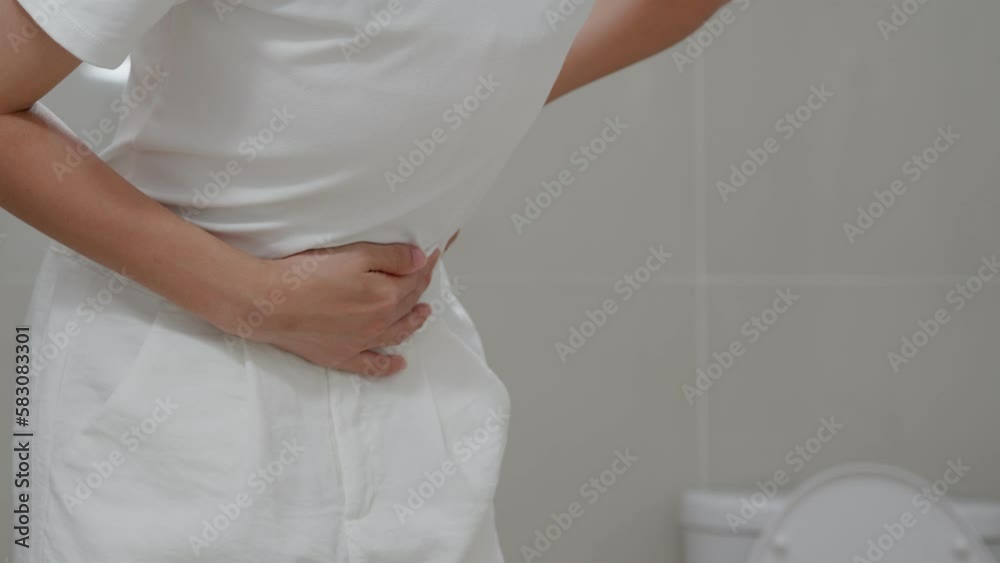 Constipation and diarrhea in bathroom. Hurt woman touch belly stomach ...