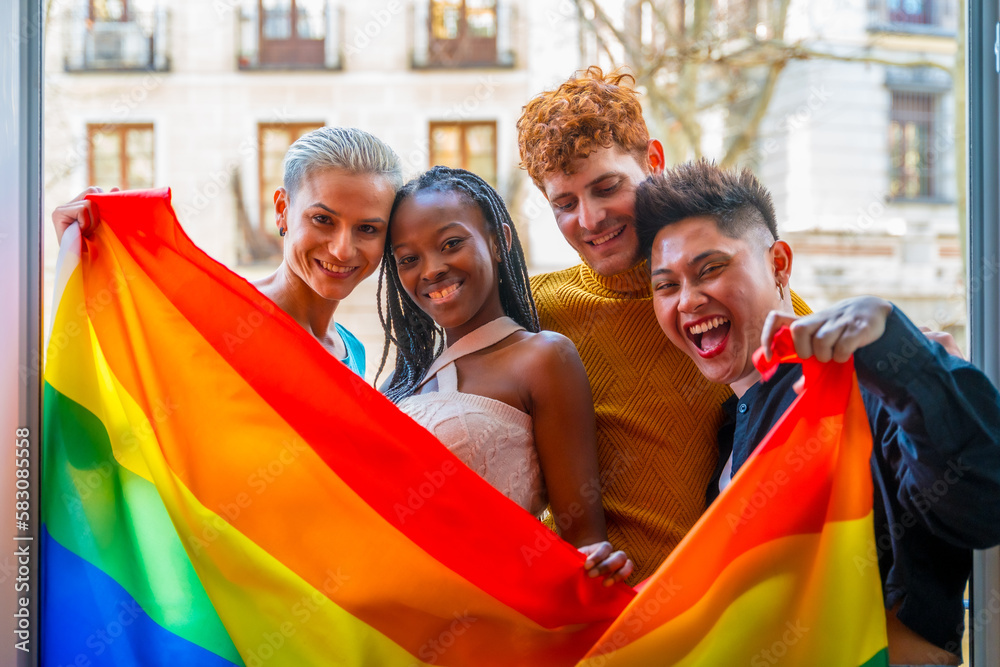 Lgtb couples of lesbian gay boys and girls in a portrait with rainbow ...