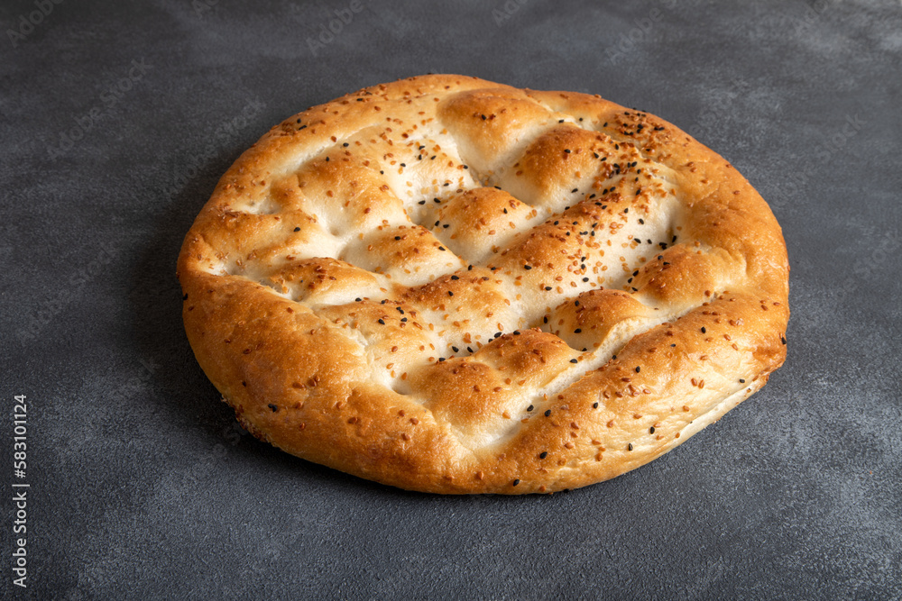 Traditional Ramadan pita on black background.Holy bread for Muslims ...