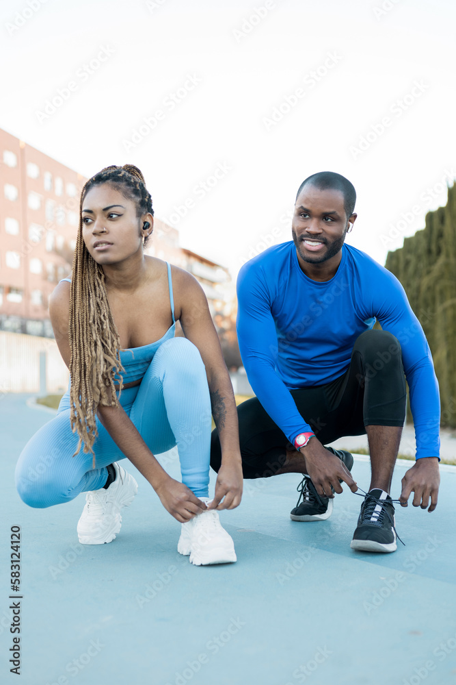 Vertical photo of a black-skinned couple spends a happy afternoon ...