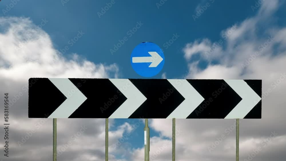 Video Stock Zoom to a sharp change of direction road sign. A sharp turn ...