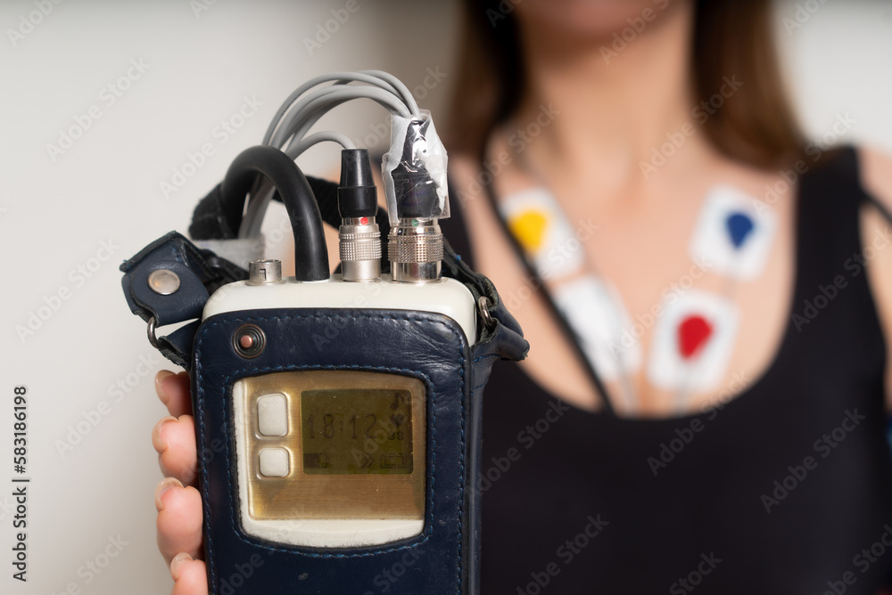 ECG sensors, electrocardiogram and blood pressure measurement. Woman ...