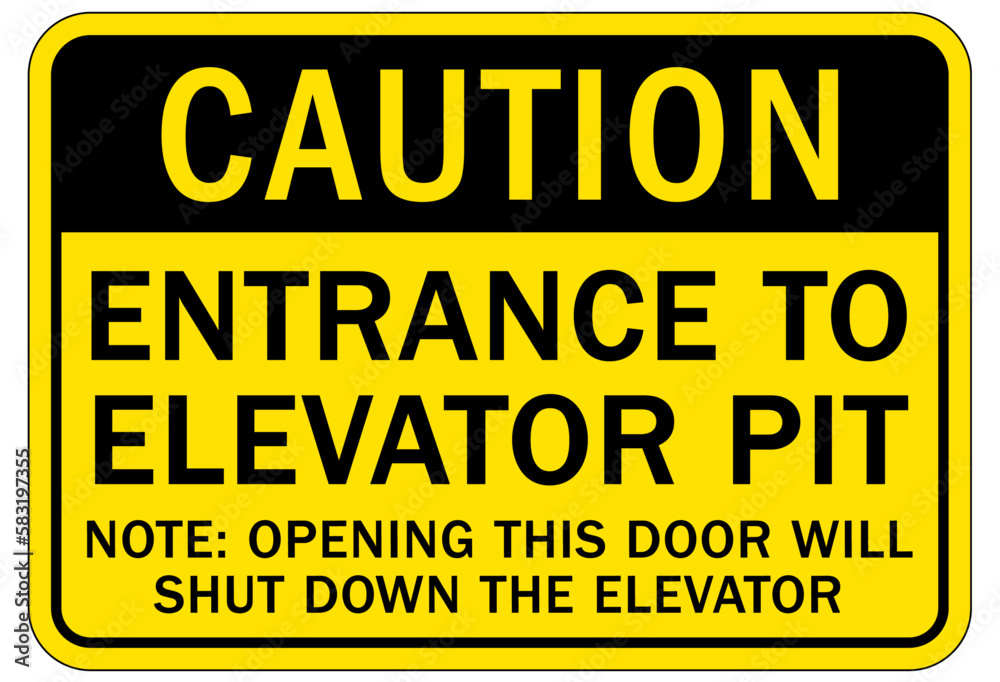 Elevator warning sign and labels entrance to elevator pit. Note ...