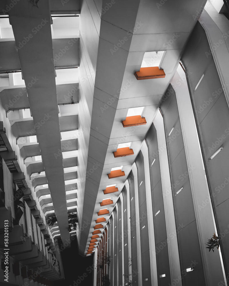Vertical flipped shot of a tall building in Singapore at night Stock ...