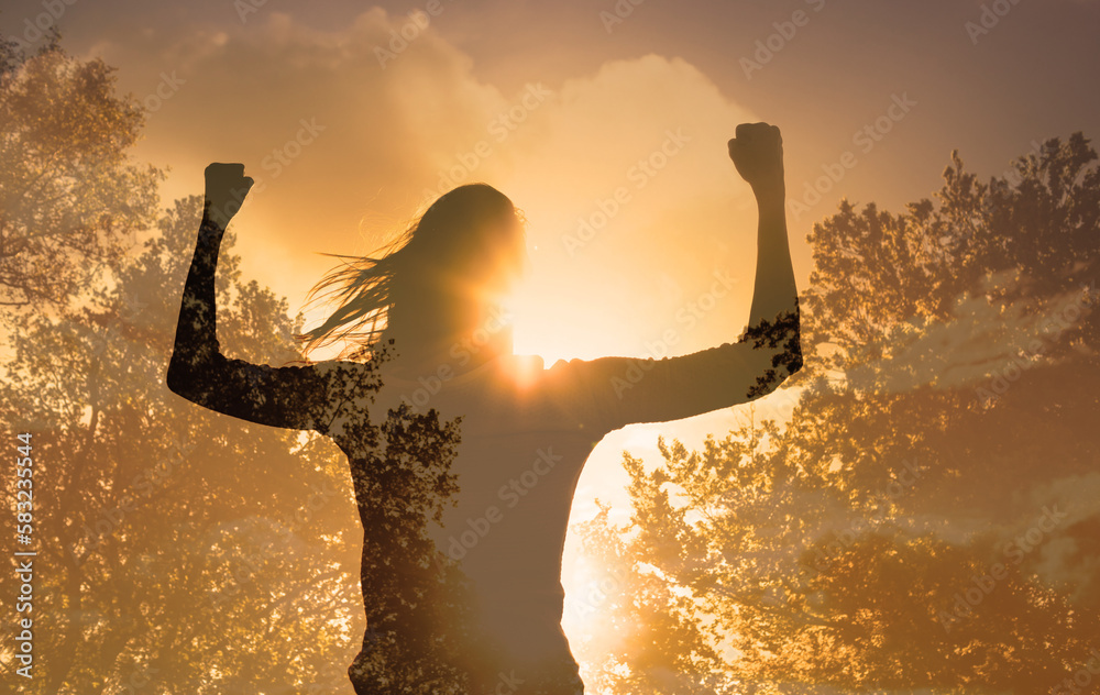 Strong, determined, motivated, powerful young female flexing arms up to ...