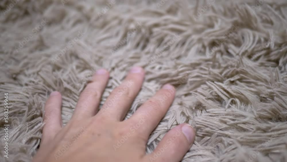 Girl Touching the Surface of a Beige Soft Warm Wool Blanket with her ...