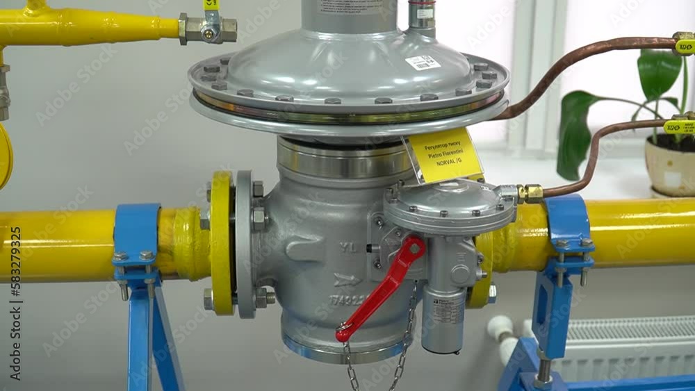 Boiler room with pipes, valves and sensors.Manometer, pipes and faucet ...