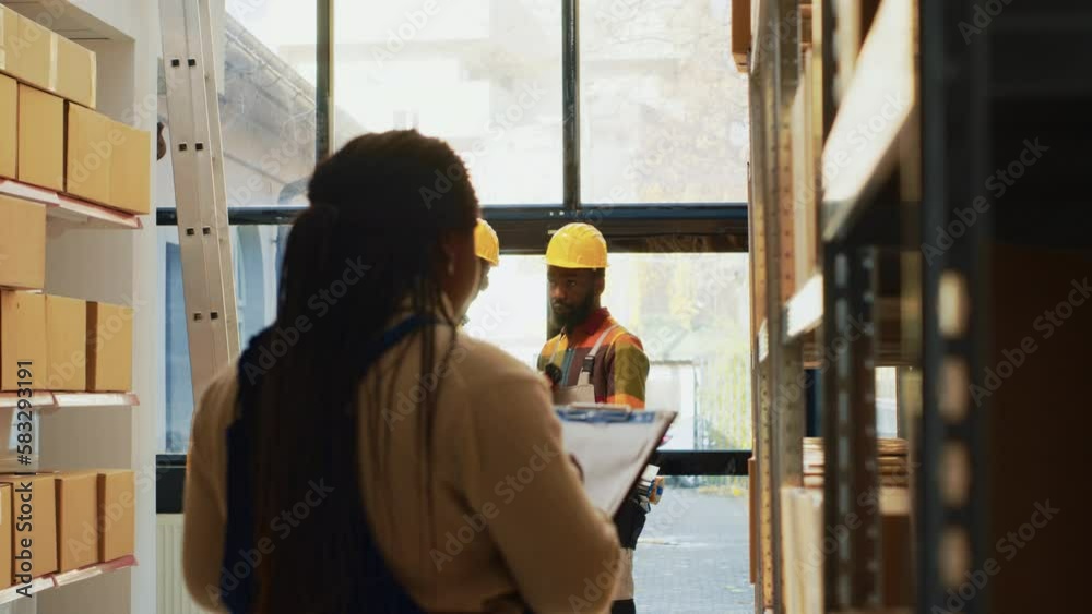 Team of men working on stock inventory in warehouse, scanning ...