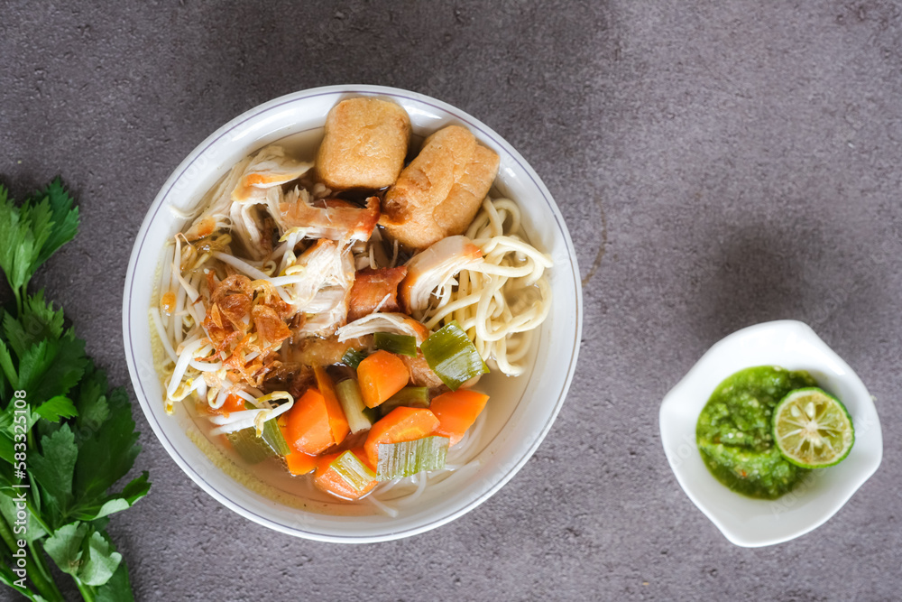 mie sop is a noodle and rice vermicelli in chicken soup with spices ...