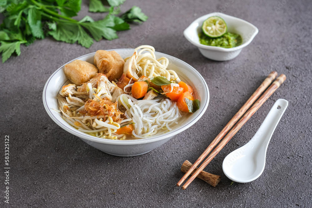 mie sop is a noodle and rice vermicelli in chicken soup with spices ...