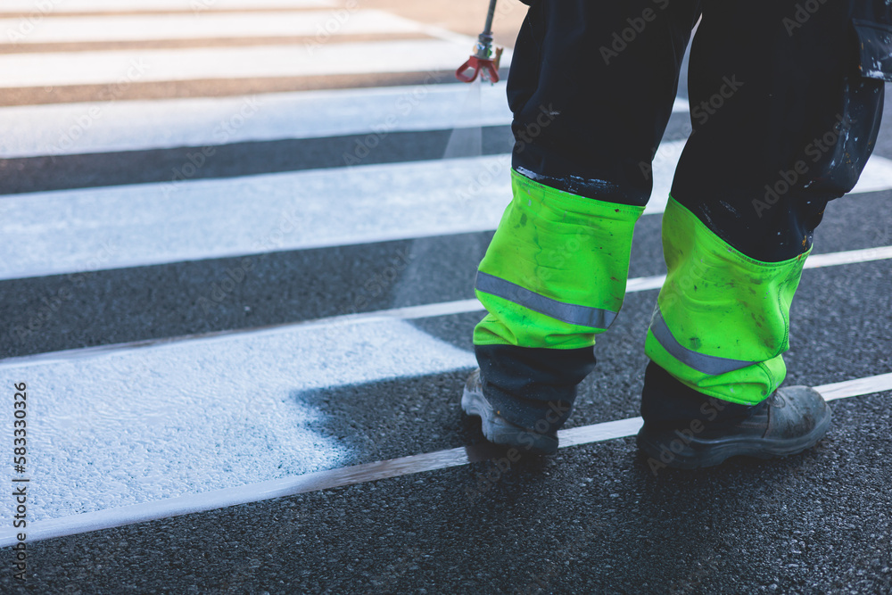 Process of making new road surface markings with a line striping ...