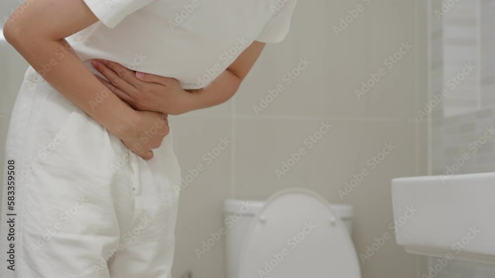 Constipation and diarrhea in bathroom. Hurt woman touch belly stomach ...