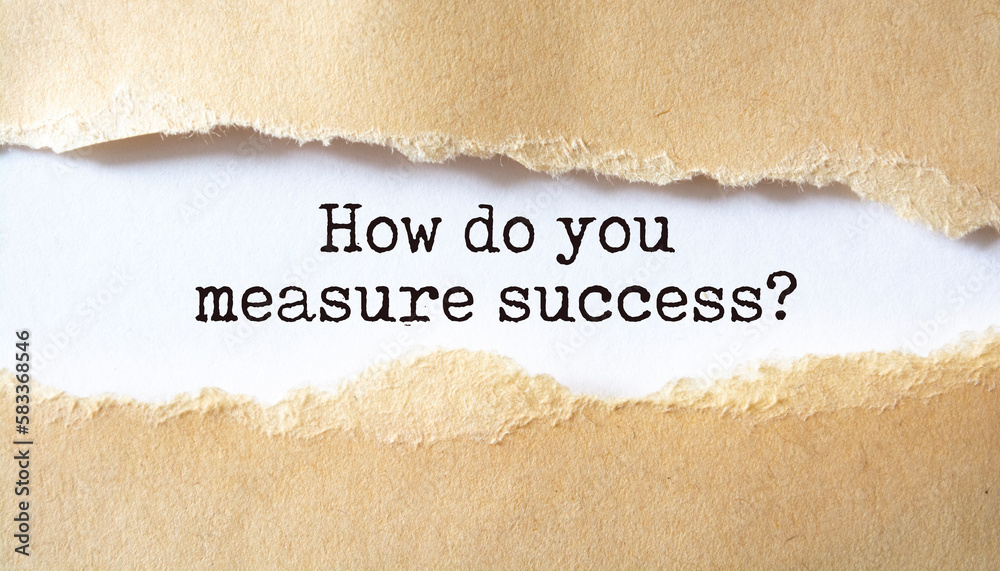 How do you measure success?. Words written under torn paper. Stock ...