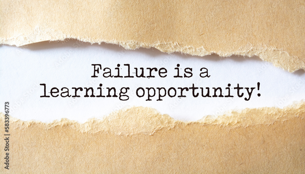Failure is a learning opportunity. Words written under torn paper ...