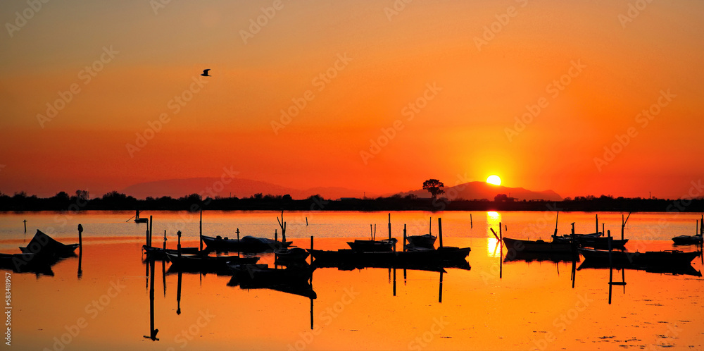 MESSOLONGHI LAGOON, GREECE. Sunset in the lagoon of Messolonghi with ...