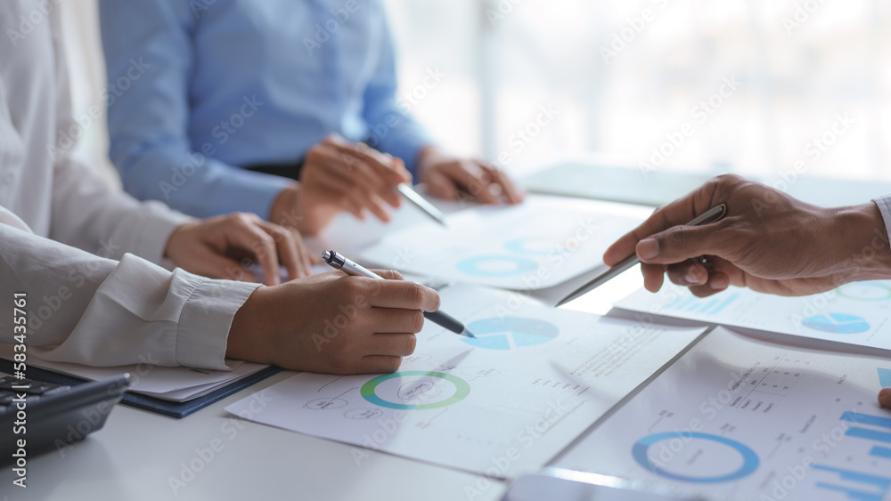 Foto de Business team together making investment plan at meeting ...