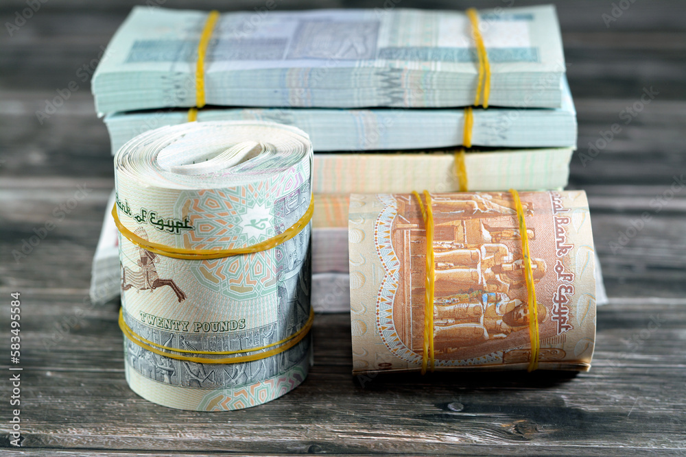 Bundles, rolls, stacks and piles of Egyptian money currency cash ...