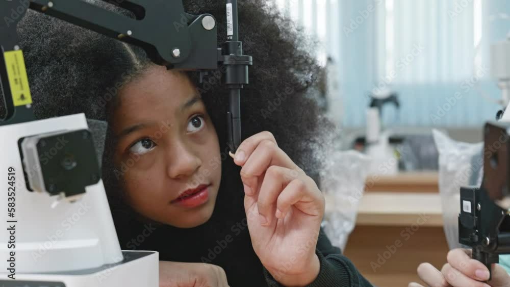 Group Kid teen child enjoy Machine Learning Robot arm is Moving Under ...