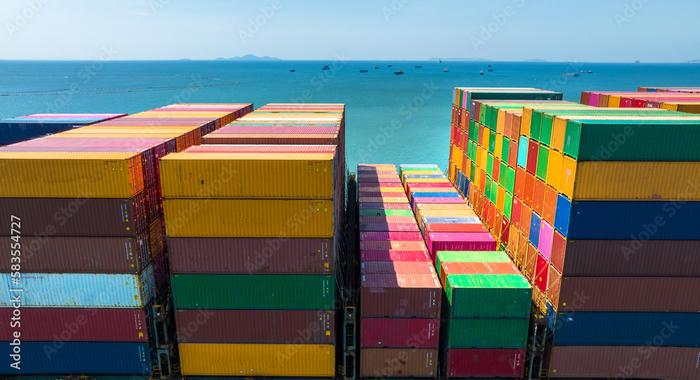 Side Ship view of Cargo Container Ship with Tug boat carrying container ...