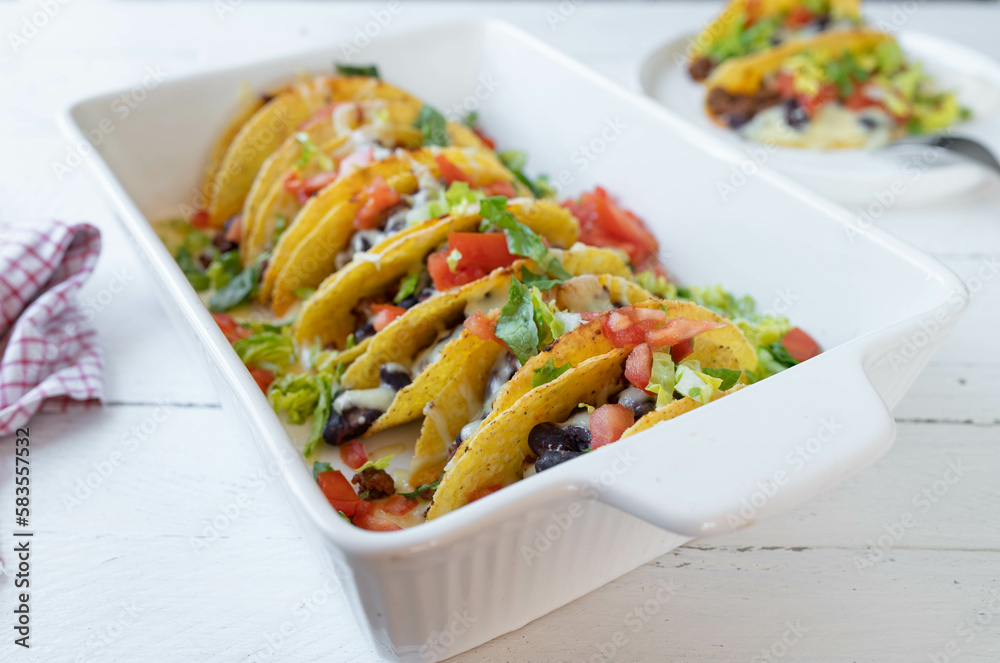 Tex mex taco casserole with ground beef, kidney beans. Gratinated with ...