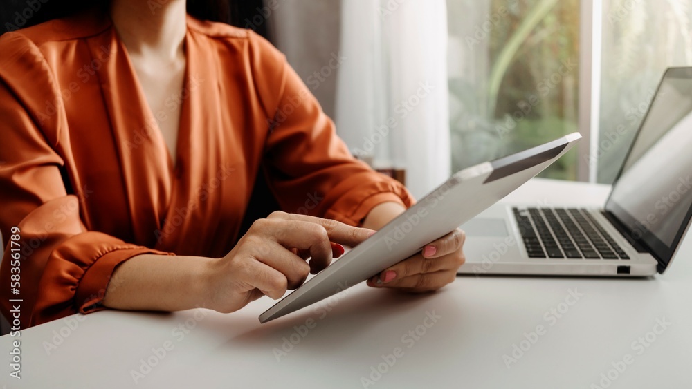 Financial advisor teamwork and accounting concept using a tablet to ...