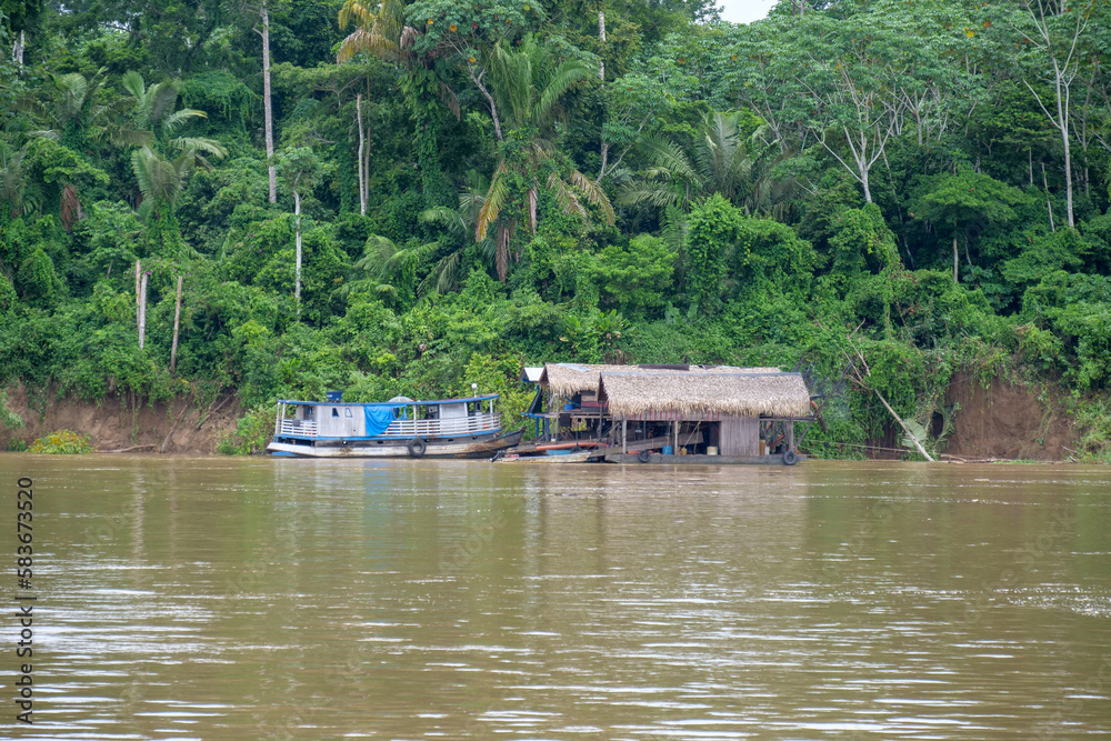 Primitive gold mining operations on the Amazon river in the Amazon ...
