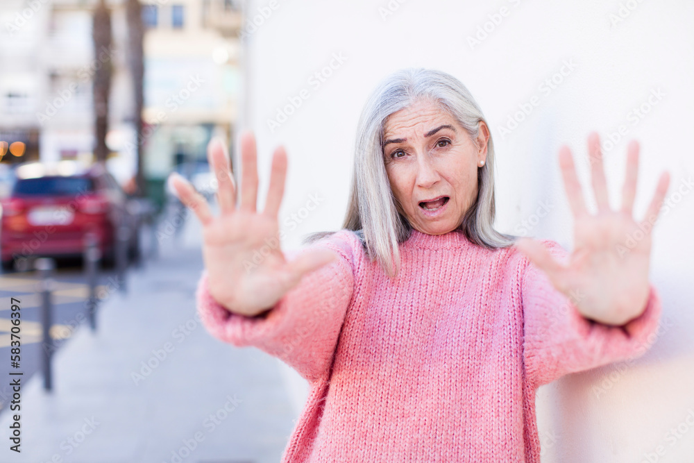 senior retired pretty white hair woman feeling stupefied and scared ...