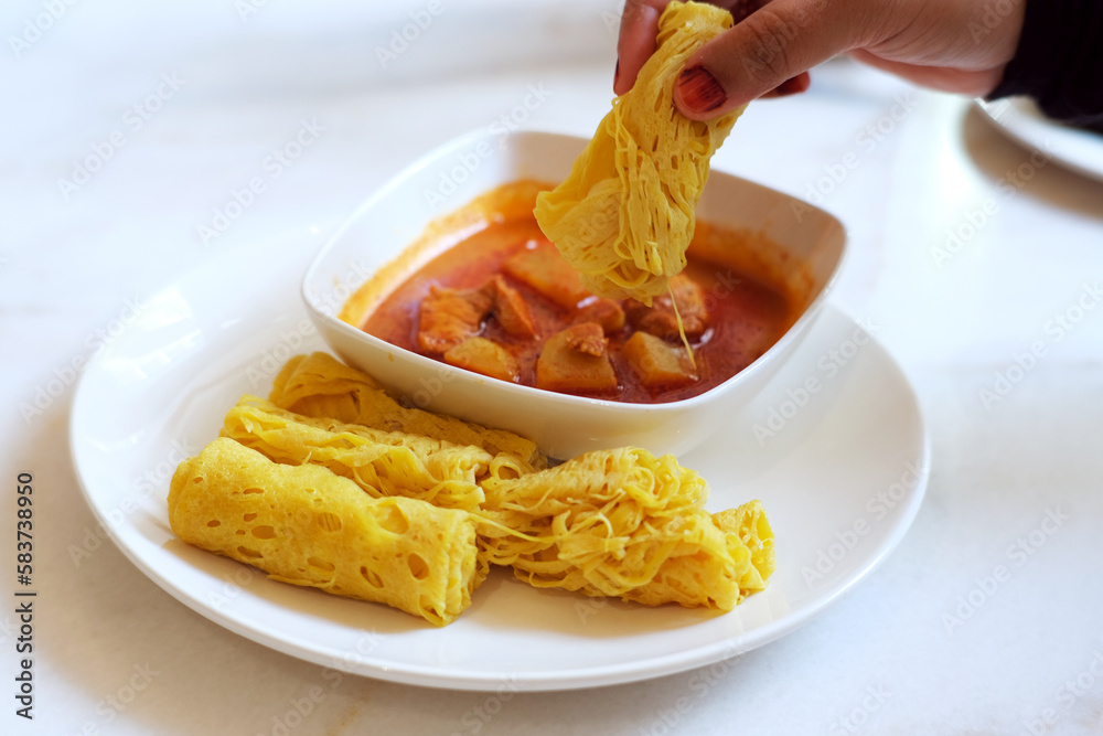 Roti Jala is a popular Malay and Minangkabau tea time snack served with ...