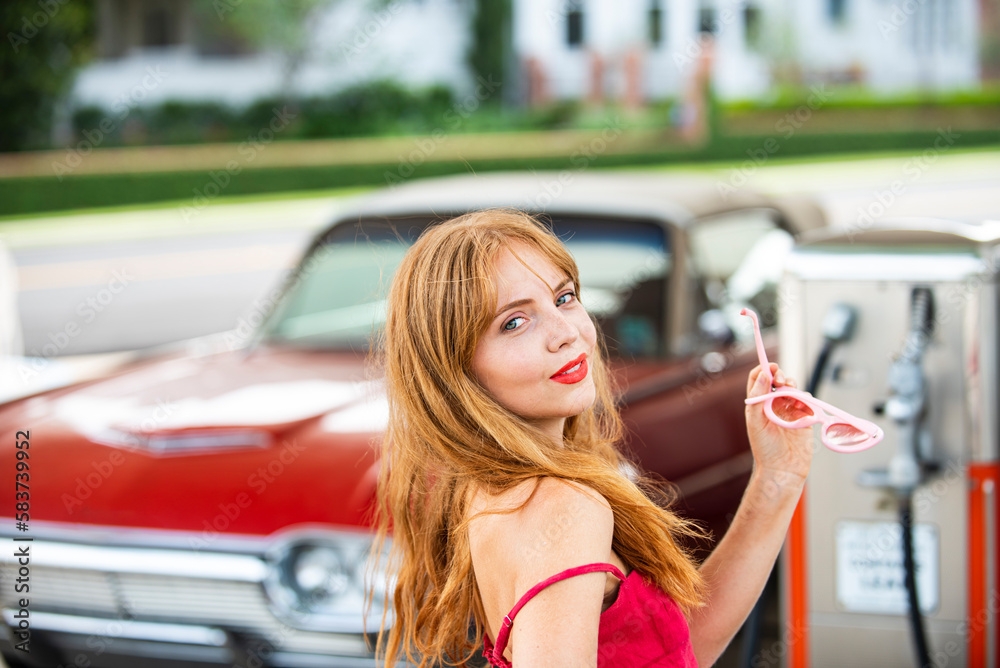 Blonde sensual young woman near car outdoor. Seductive woman face. Sensual young woman posing ...