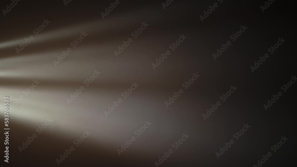 left Volumetric Beam. 4K beautiful white spotlight effects moving on ...