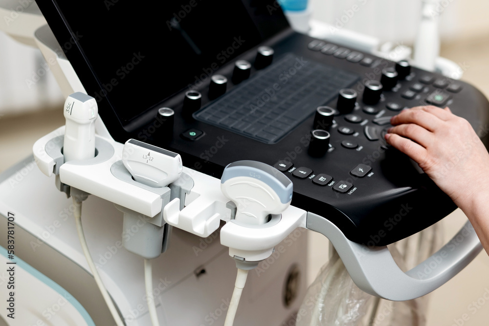 Ultrasound diagnosis of the thyroid gland of a young woman in the ...