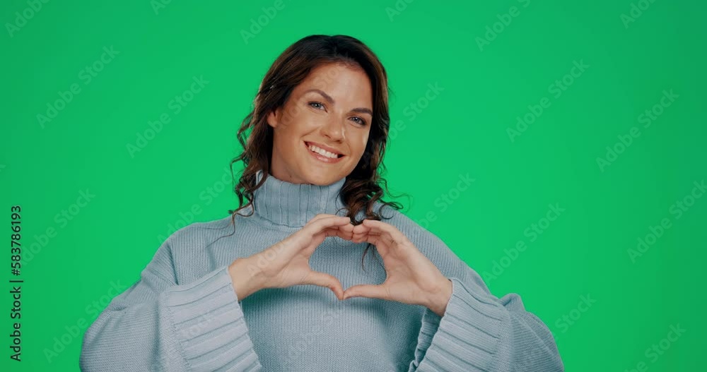 Heart, green screen and portrait of a woman with a hand sign isolated ...