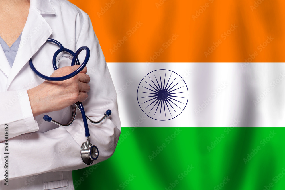 Indian medicine and healthcare concept. Doctor close up against flag of ...