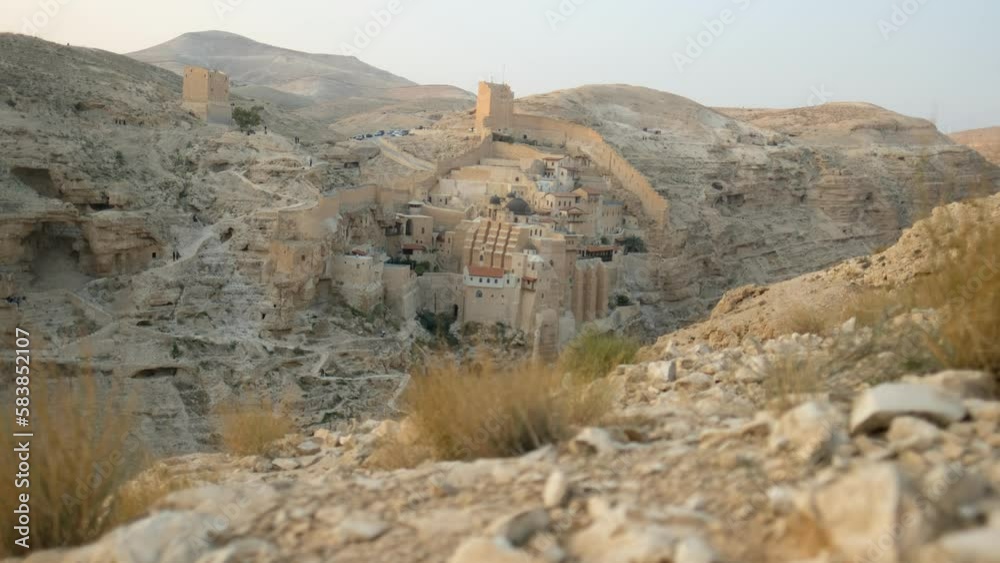 A Byzantine period monastery built on the rocks above a desert wadi ...