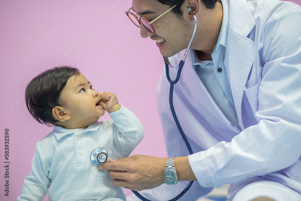 Mail pediatrician doctor in white cost gown hold stethoscope exam child ...