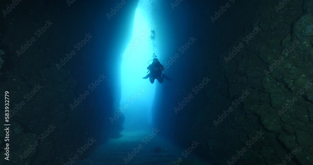cave diving underwater scuba divers exploring caves and having fun ...