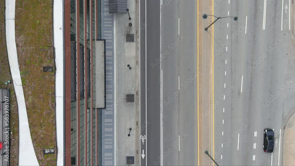 overhead aerial footage along 17th Street with cars and trucks driving ...