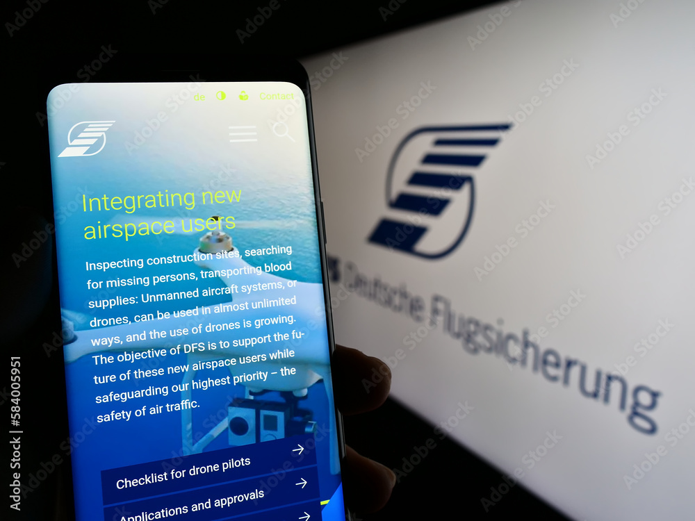 Stuttgart, Germany - 03-18-2023: Person holding smartphone with webpage ...