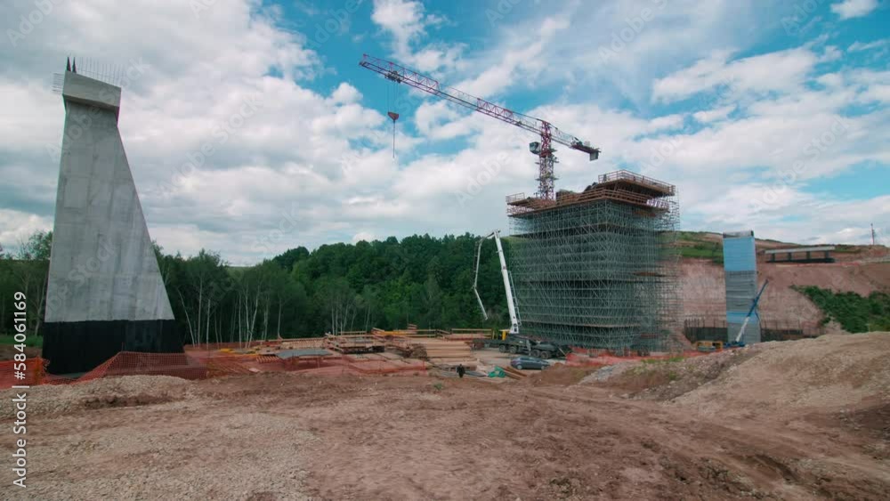 Tower crane for creating road bridge concrete abutment structure on ...