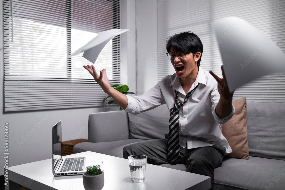 Angered, furious, crazy and mad millennial Asian businessman or man ...