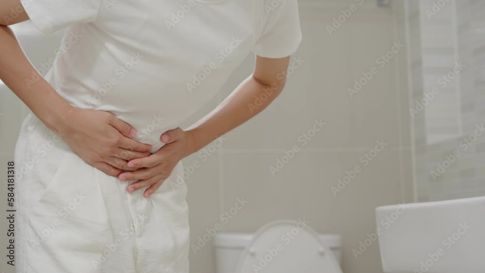 Constipation and diarrhea in bathroom. Hurt woman touch belly stomach ...