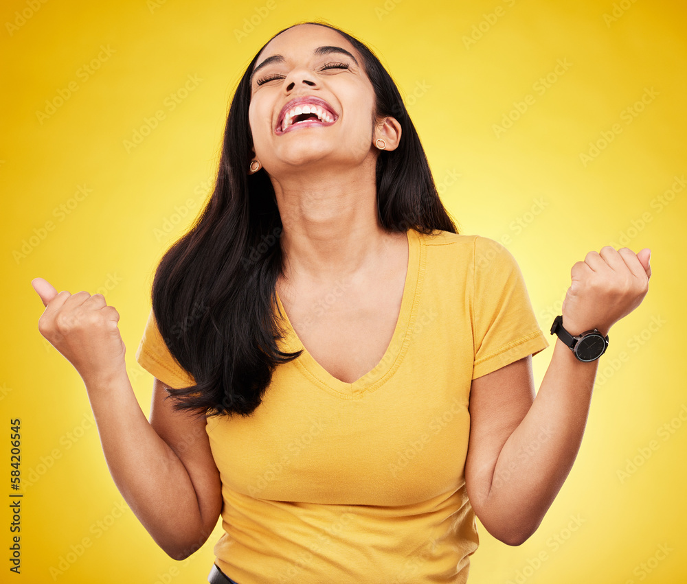 Woman, happy and fist of winner in studio for celebration, achievement ...