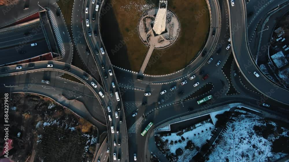 Top down view of a complex roundabout road intersection with a column ...