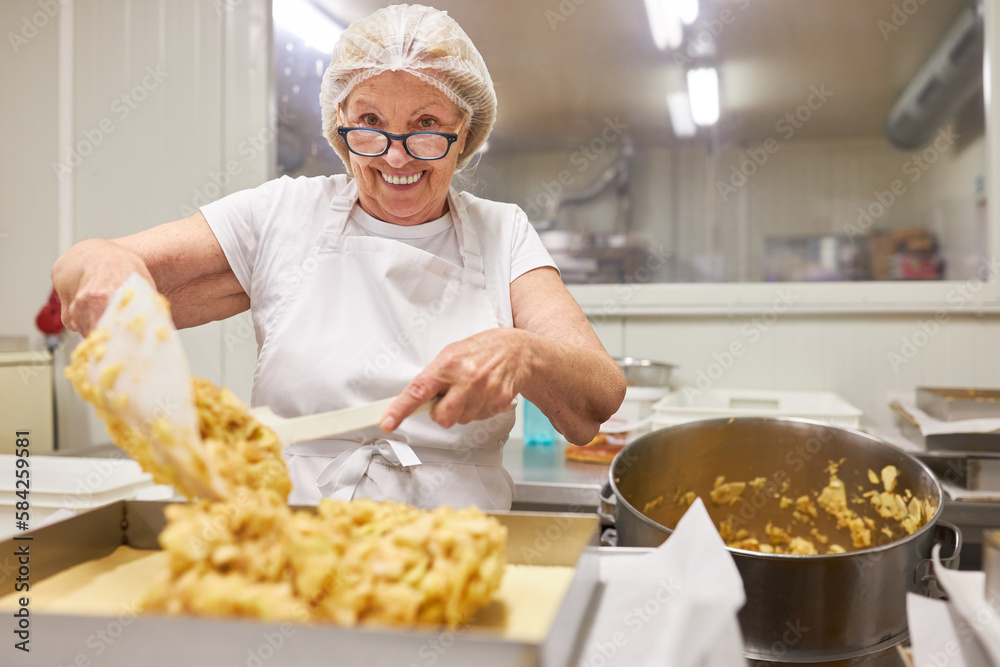 Baker bakes apple pie and fills dough in baking pan Stock Photo | Adobe ...