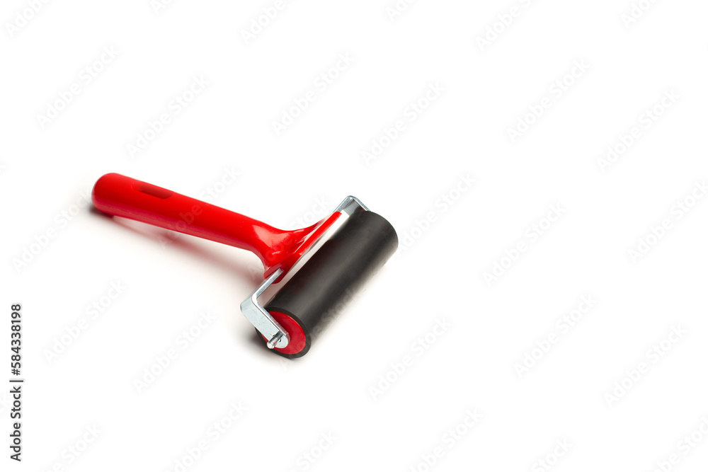 Rodillo de grabado sobre un fondo blanco liso y aislado. Vista de ...