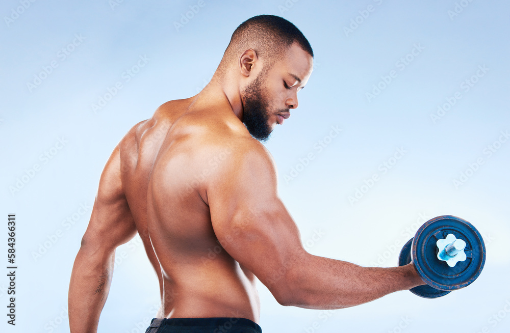 Black man, fitness and bodybuilder, weightlifting with dumbbell and ...