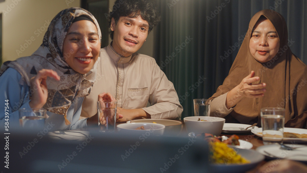 Happy Asian muslim family celebrate long distance with cousin video ...