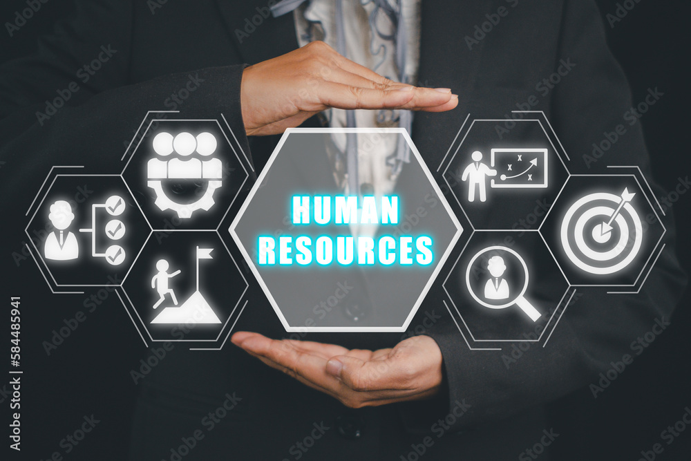Business woman hand holding human resource icon on a virtual screen ...