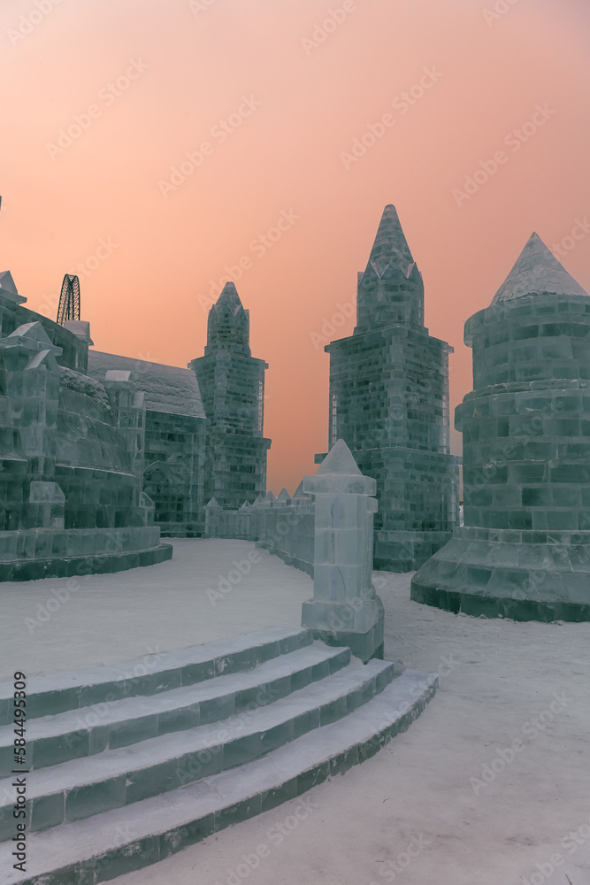 January 1, 2022, HARBIN, CHINA. Staircase to palace made of ice blocks ...