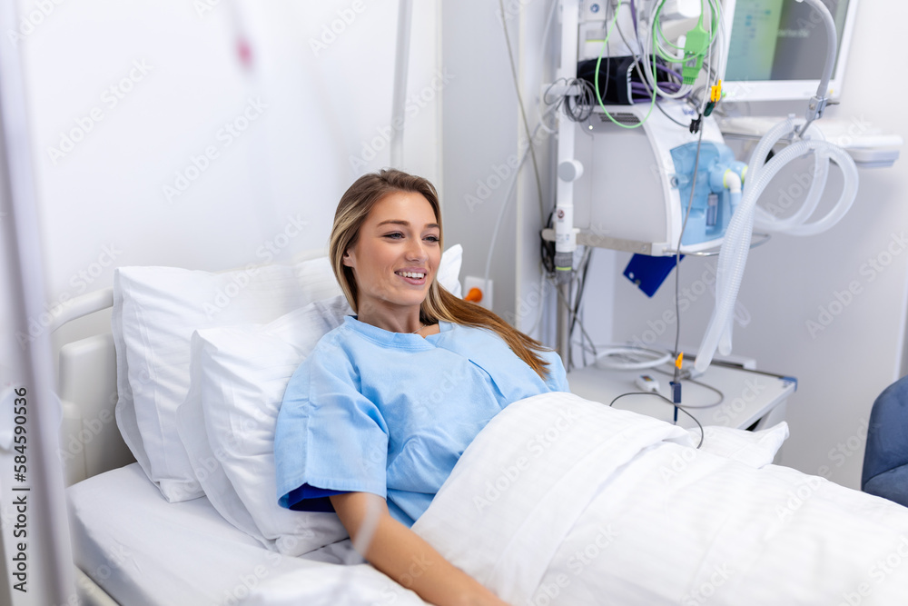Young woman laying on bed at hospital ward. medicine, health care and ...